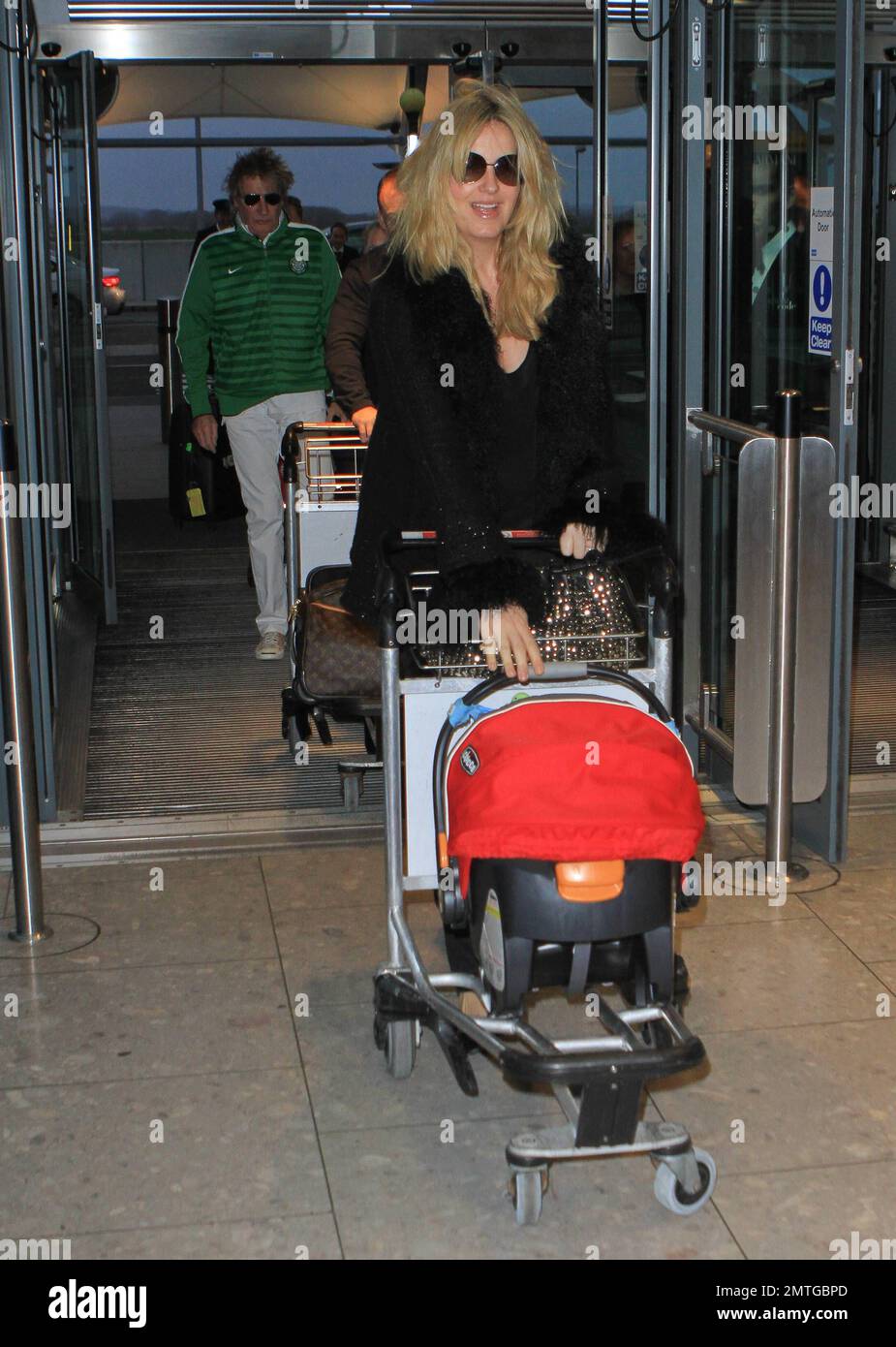Rocker Rod Stewart, wife Penny Lancaster and their two children ...