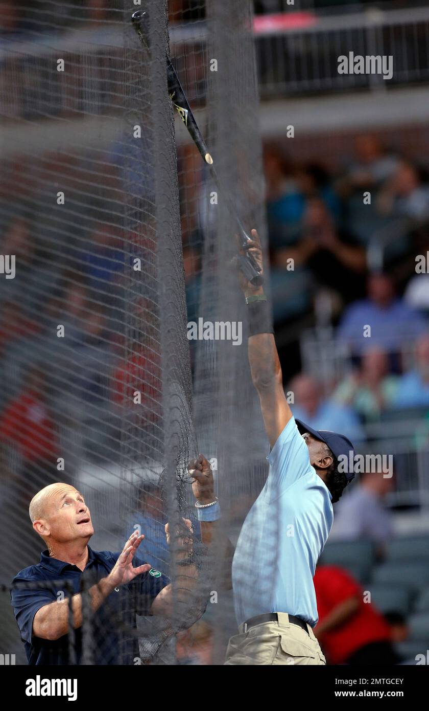 Atlanta Braves field director Ed Mangan and security guard Joe Copeland ...