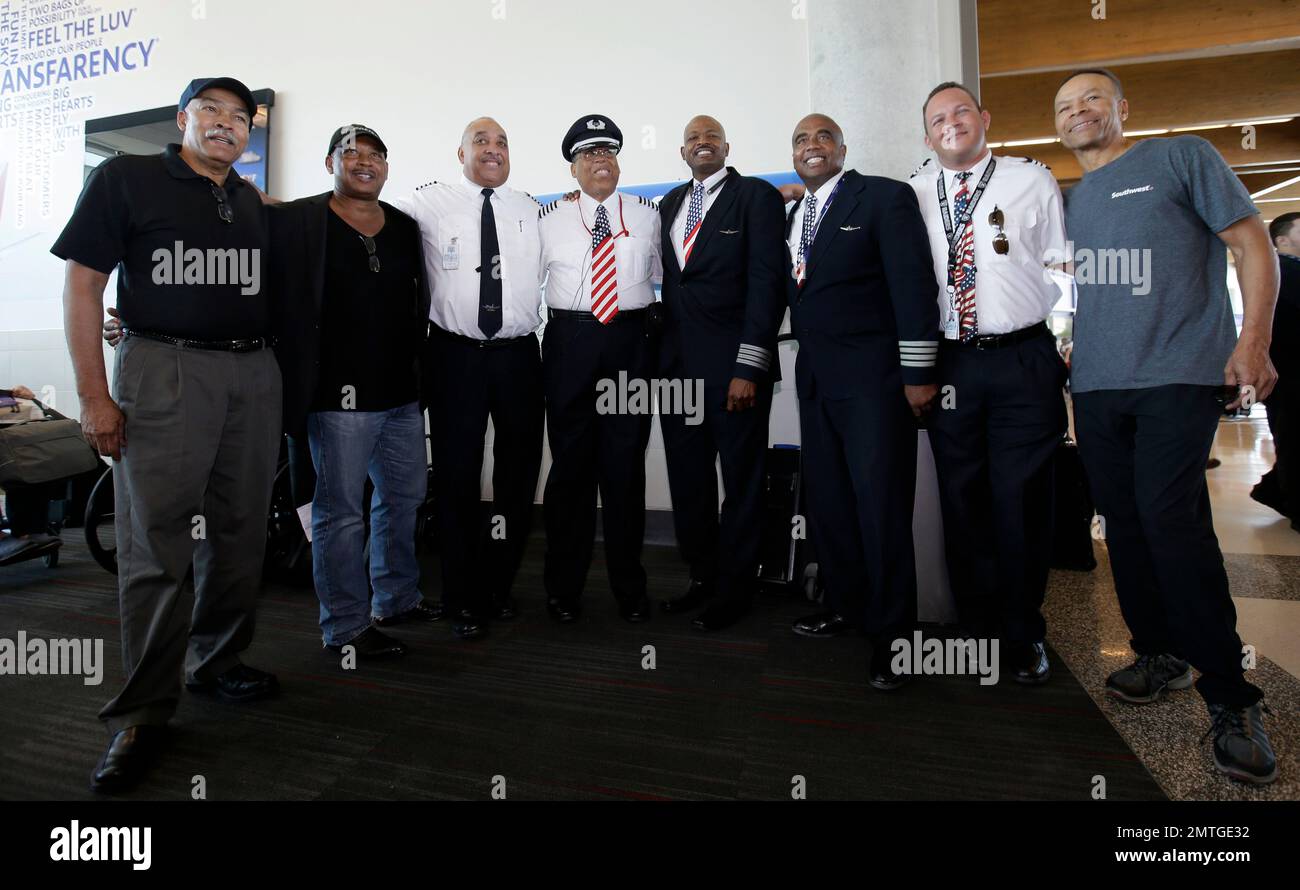 Southwest Airlines captain Louis Freeman, fourth from left, poses for ...