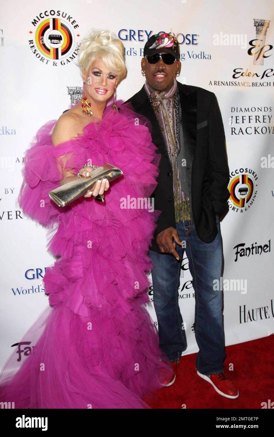Dennis Rodman and Elaine Lancaster pose on the red carpet at the 14th ...