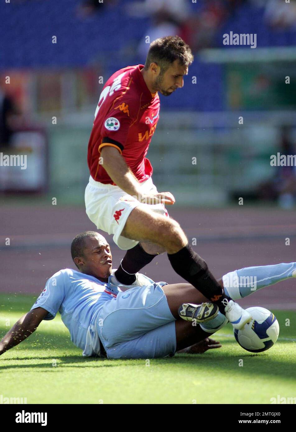 Vucinic Mirko fight a ball with Santacroce Fabiano in the 2008-2009 ...