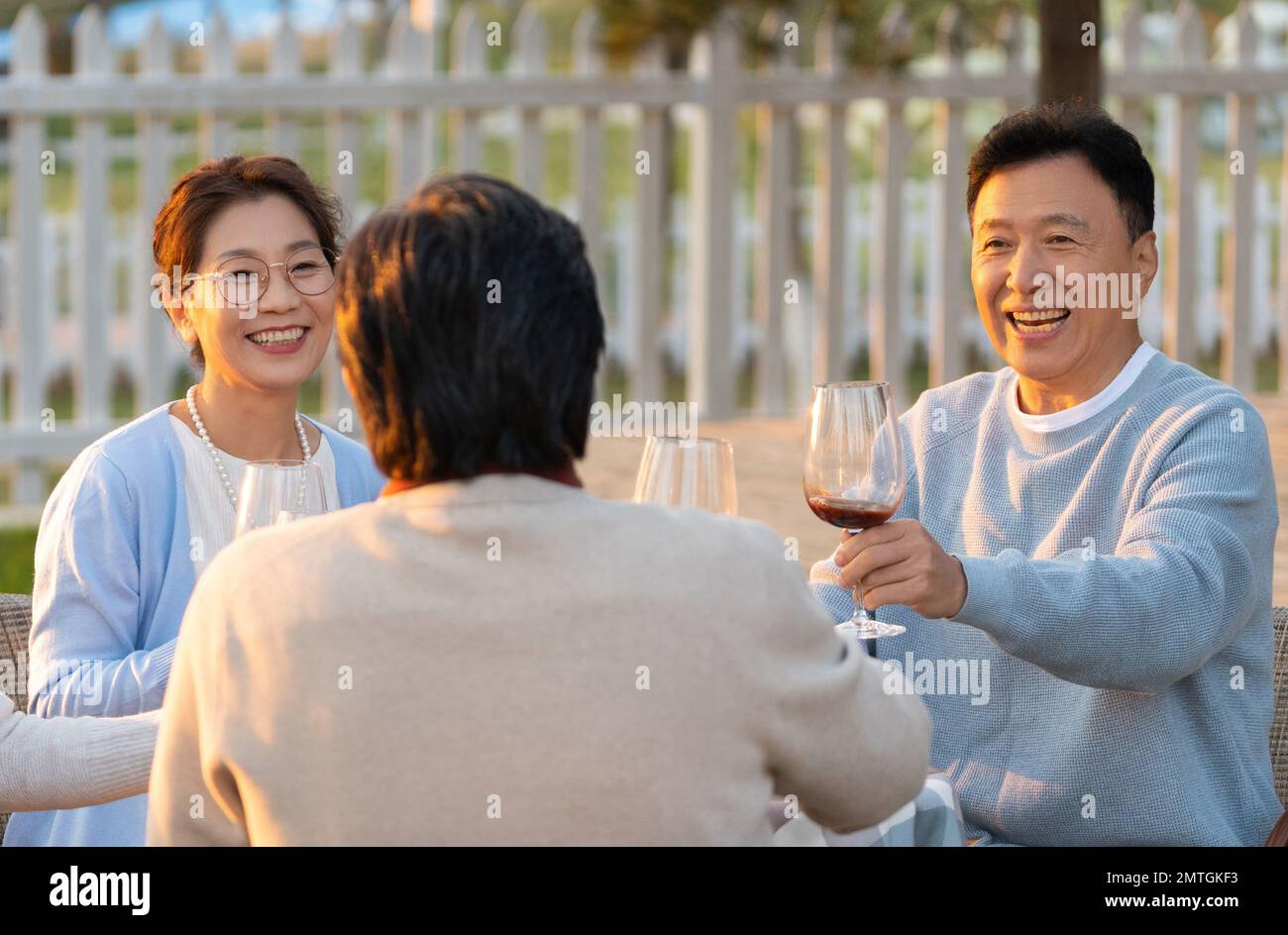 Three friends in the courtyard hi-res stock photography and images - Alamy