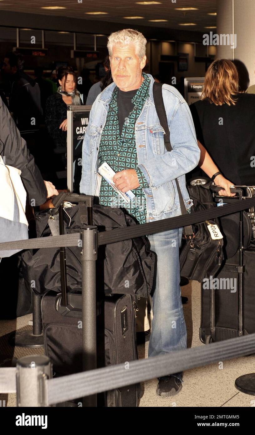 EXCLUSIVE!! Ron Perlman at Miami International Airport to catch a ...