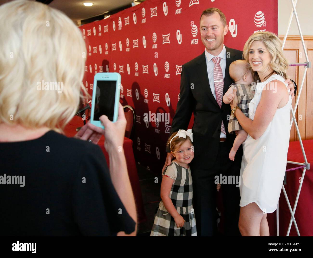 Newly named Oklahoma football coach Lincoln Riley poses for a photo ...
