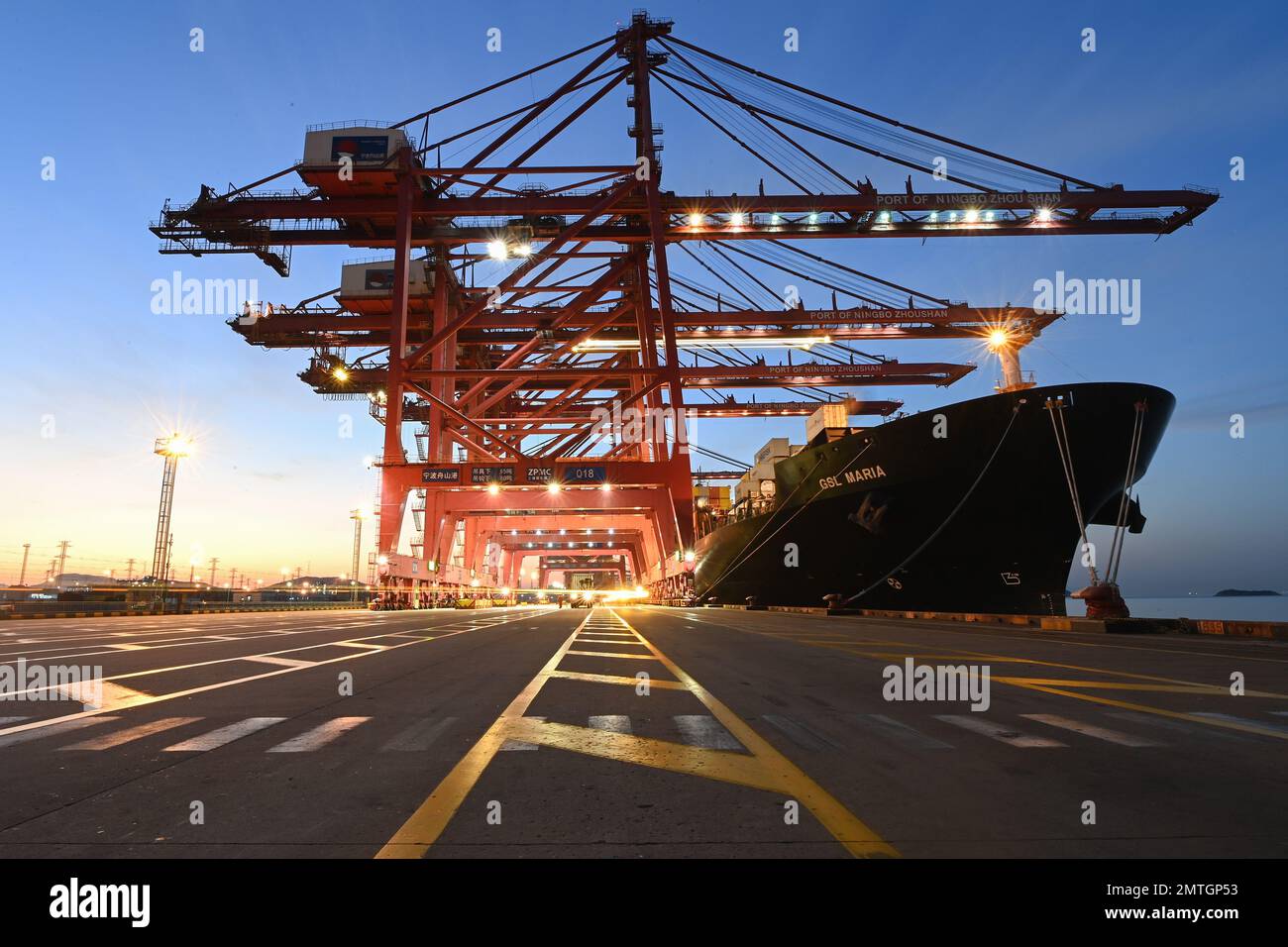 Ningbo. 31st Jan, 2023. This photo taken on Jan. 31, 2023 shows a cargo ...