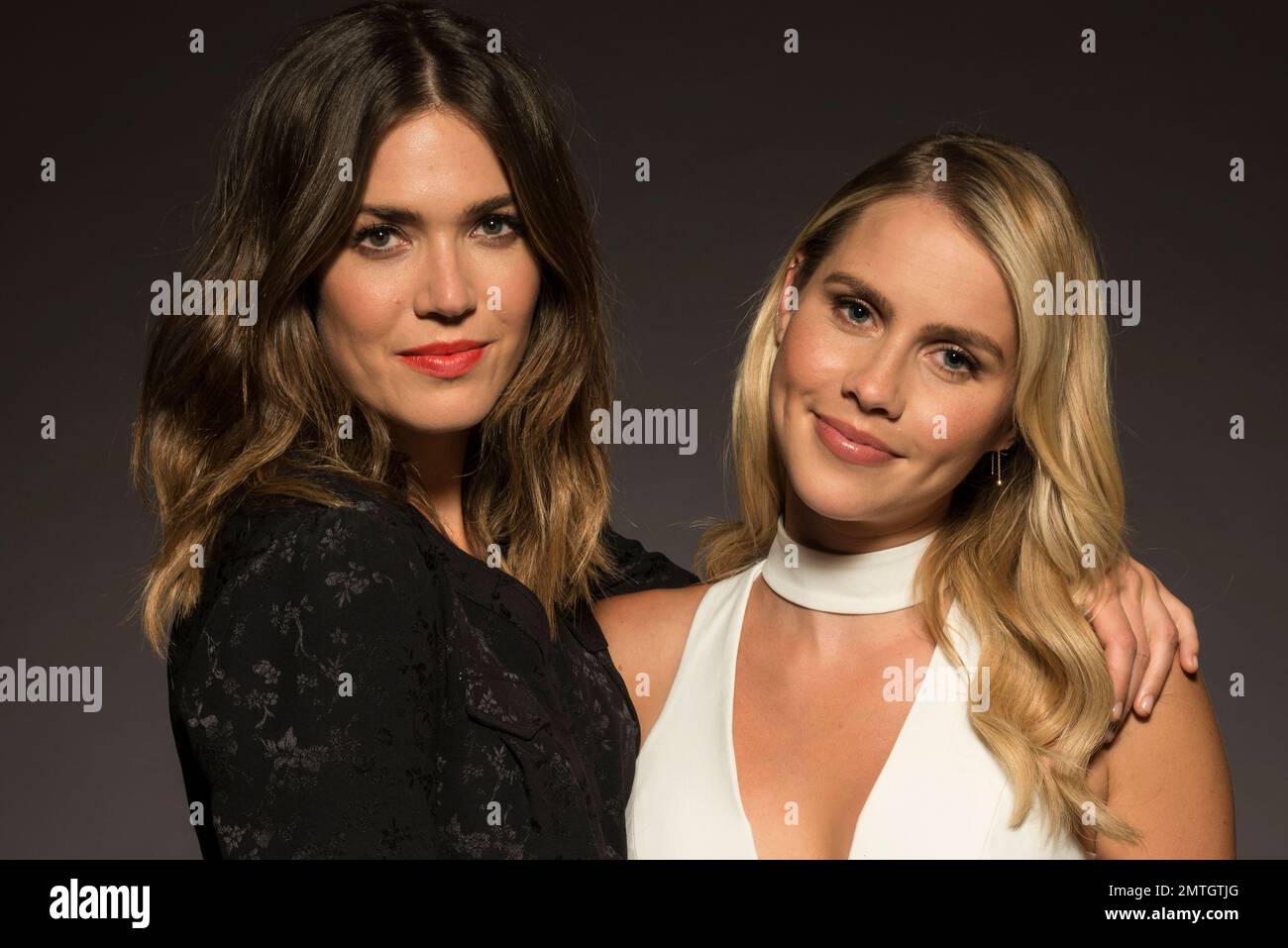 In this June 2, 2017 photo, Mandy Moore, left, and Claire Holt pose for ...