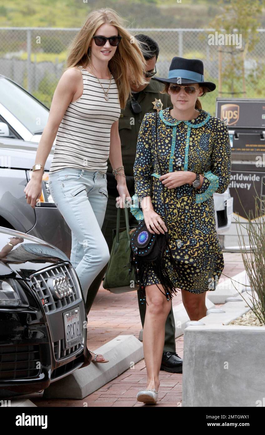 Supermodel-turned-actress Rosie Huntington-Whiteley along with a friend ...