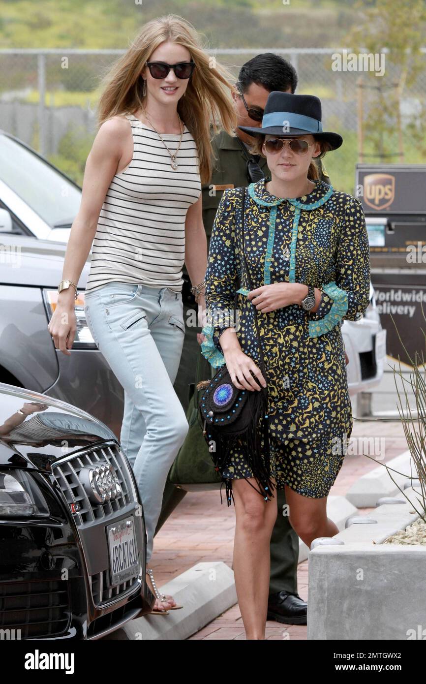 Supermodel-turned-actress Rosie Huntington-Whiteley along with a friend ...