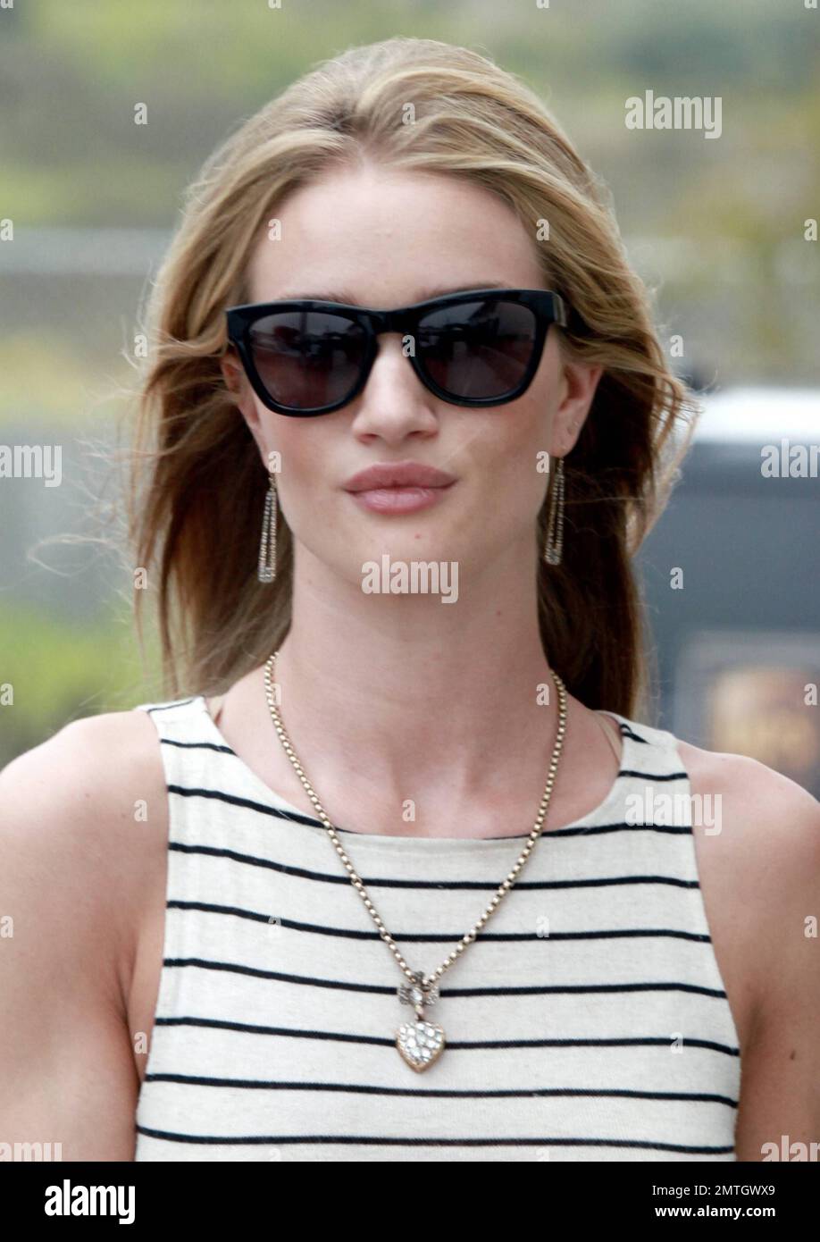 Supermodel-turned-actress Rosie Huntington-Whiteley along with a friend ...