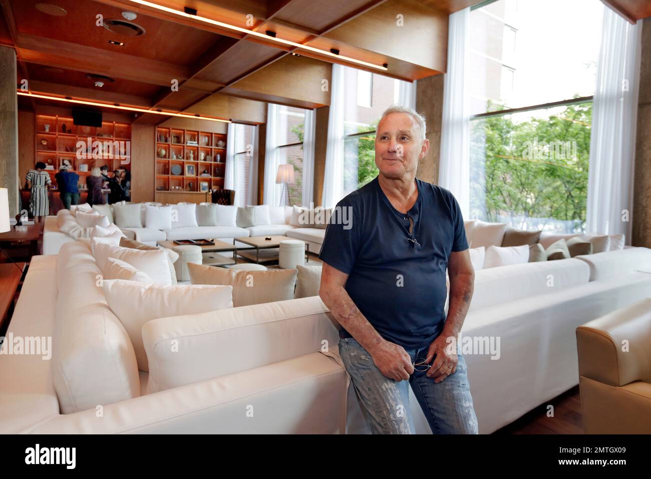 This June 1, 2017 photo shows hotelier Ian Schrager in a lounge area at ...