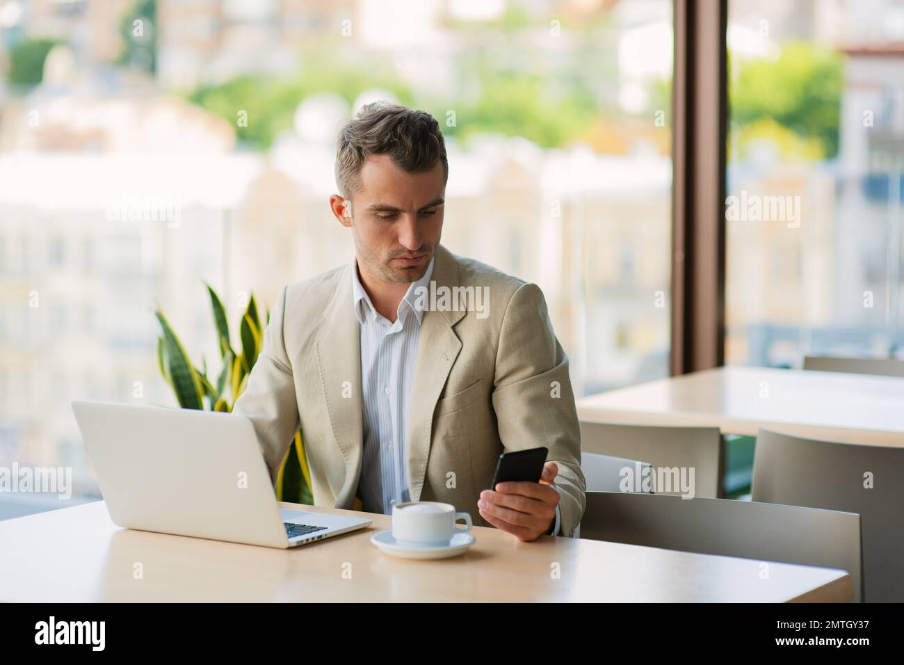 Elegant Confident Businessman or stock trader analyzing stock graph ...