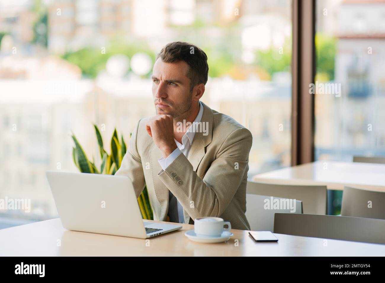 Elegant Confident Businessman or stock trader analyzing stock graph ...