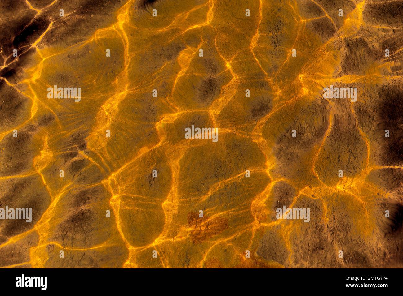 Bright reflection of the sun from the waves of transparent water Stock ...