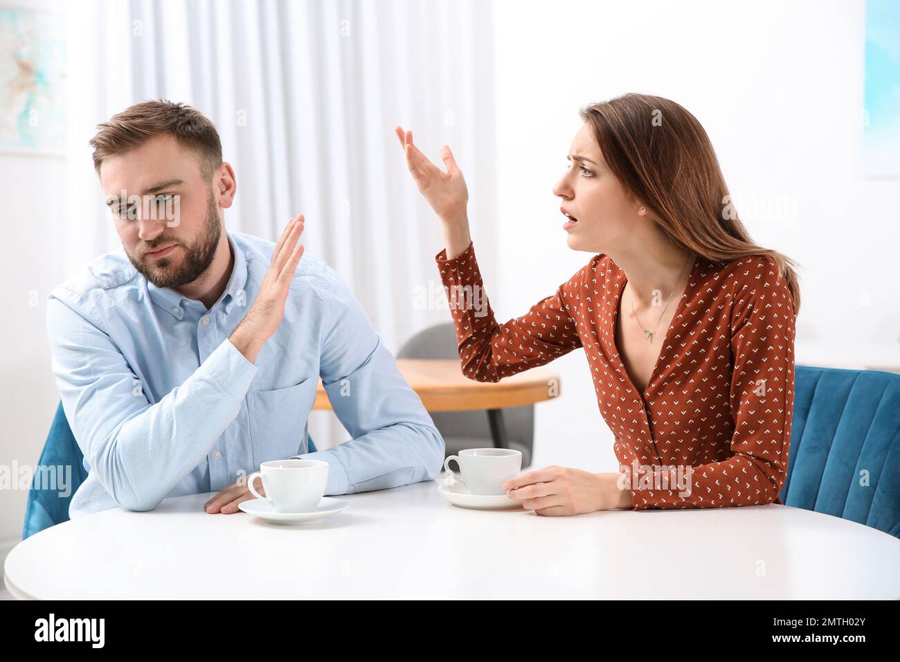 Couple quarrel in cafe separation hi-res stock photography and images ...