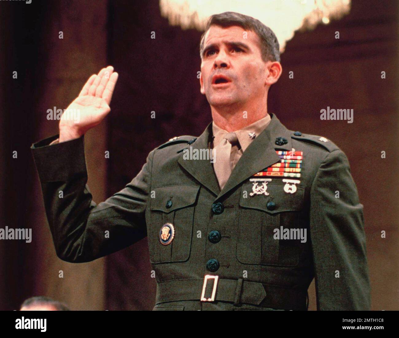 FILE - In this July 7, 1987, file photo, Lt. Col. Oliver North is sworn ...
