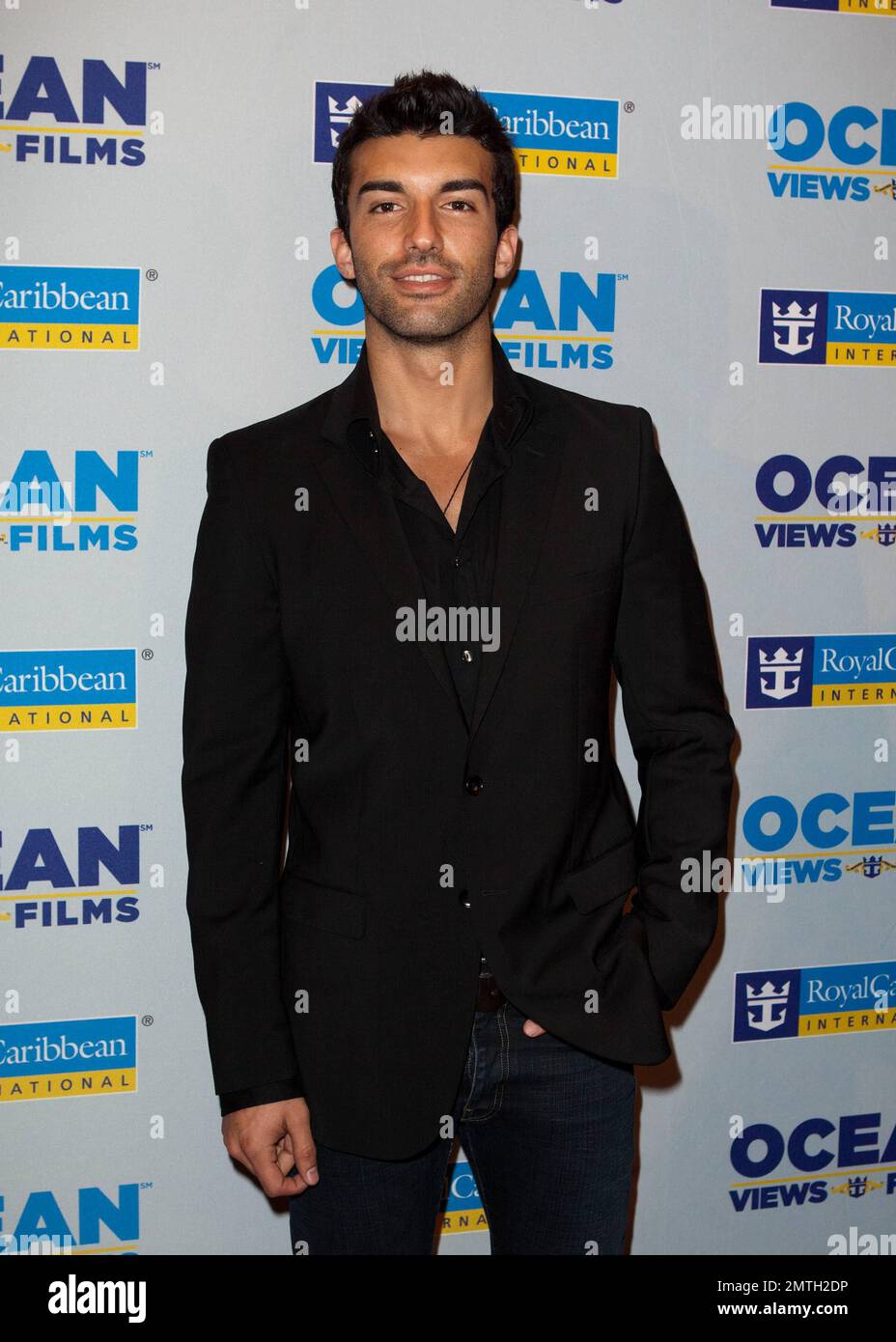Justin Baldoni poses for photographers aboard the Allure of the Seas ...