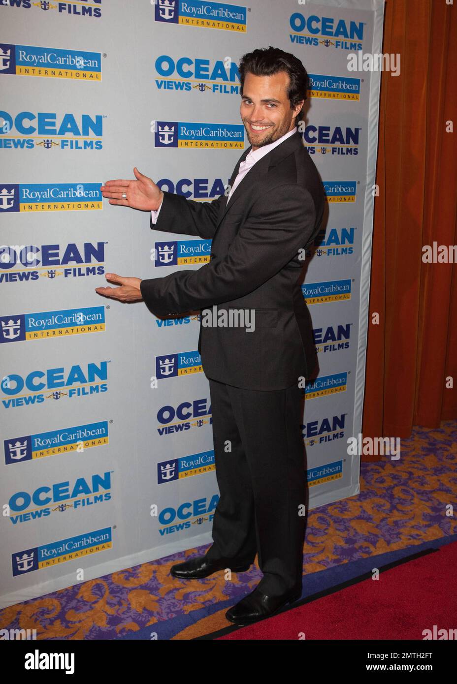Scott Elrod poses for photographers aboard the Allure of the Seas ...