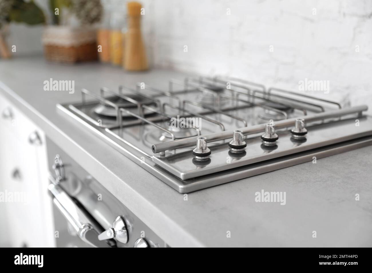 New modern stove with gas burners in kitchen, closeup Stock Photo - Alamy
