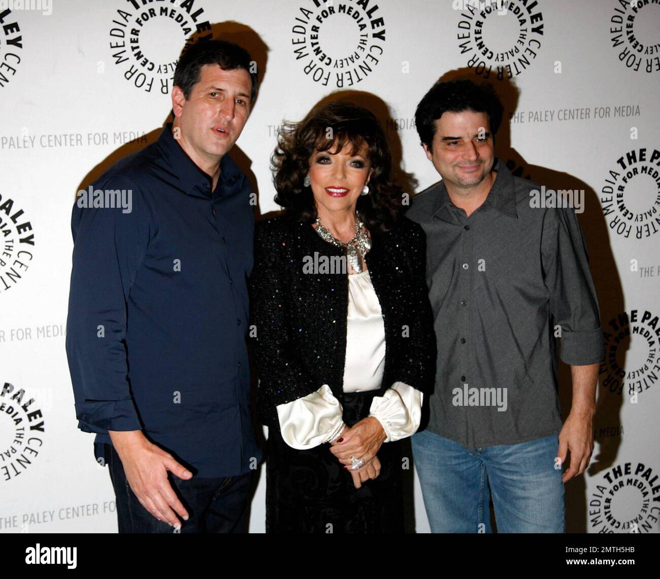 Doug Robinson, Joan Collins and Tom Hertz at a special premiere of ...