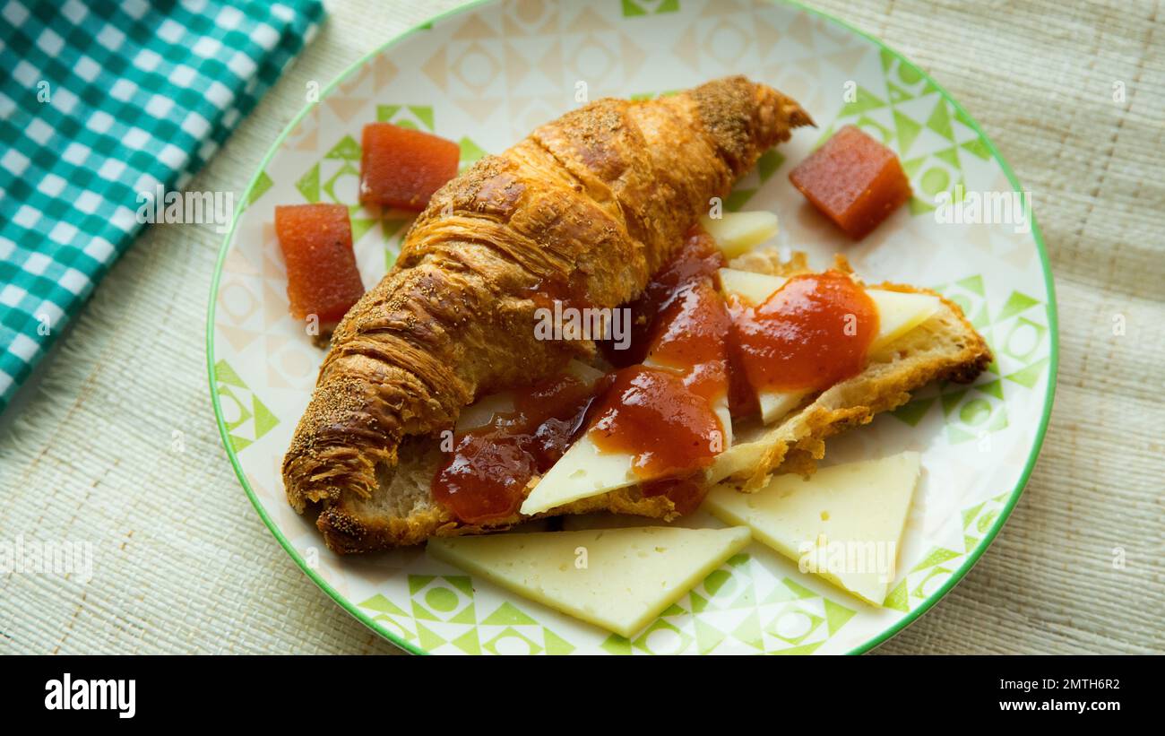 Croissant with quince jelly and cheese Stock Photo - Alamy