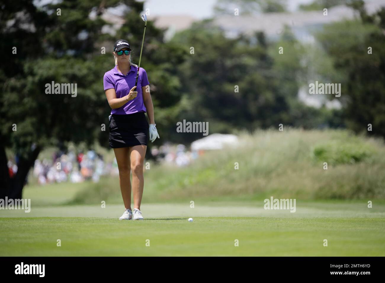 Anna Nordqvist, of Sweden, lines up a shot on the third green during ...