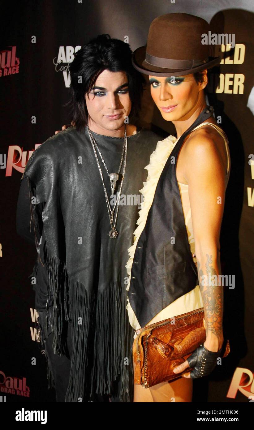 In a leather fringe poncho, leather bellbottoms and blue eye makeup ...