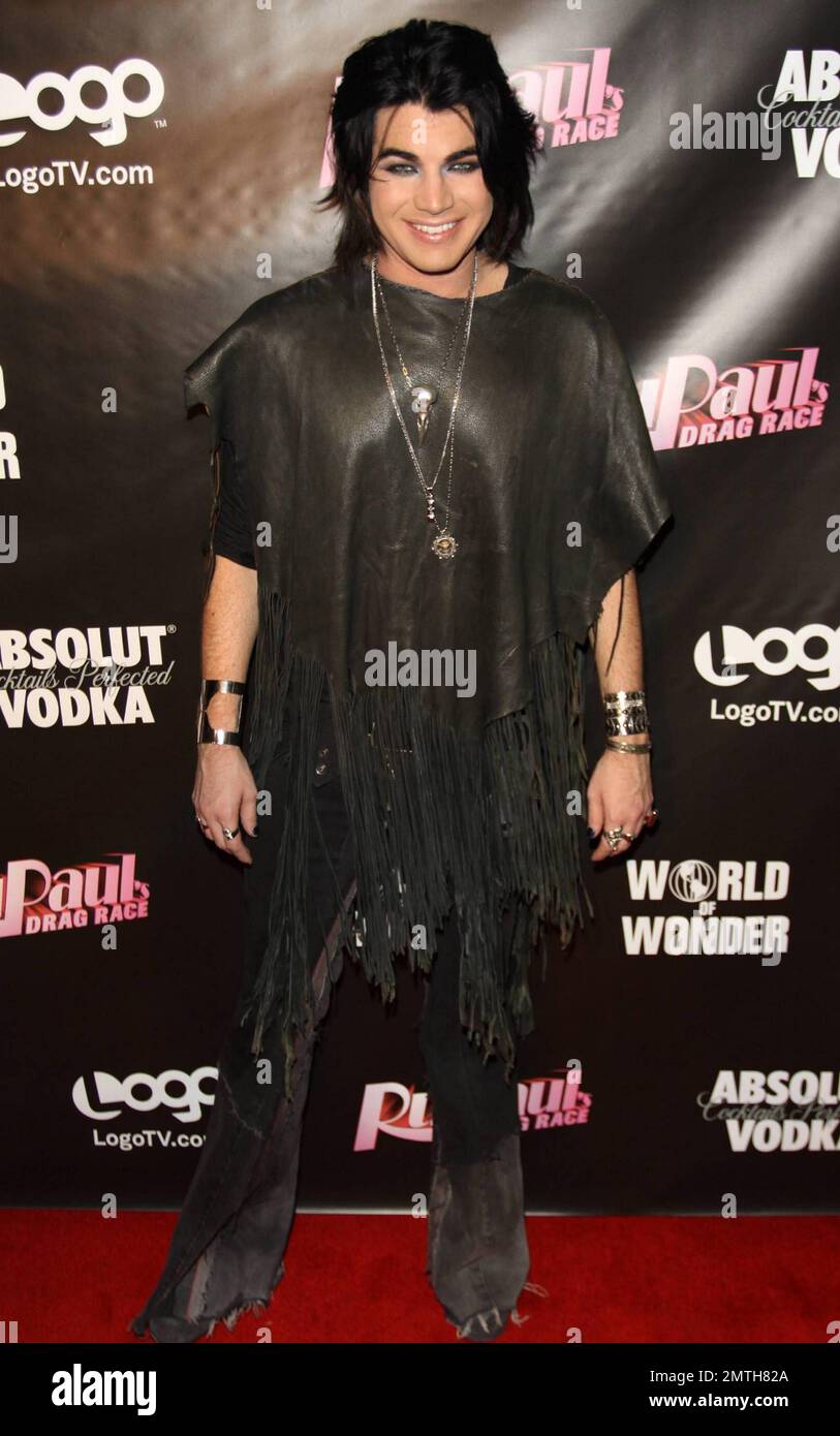 In a leather fringe poncho, leather bellbottoms and blue eye makeup ...