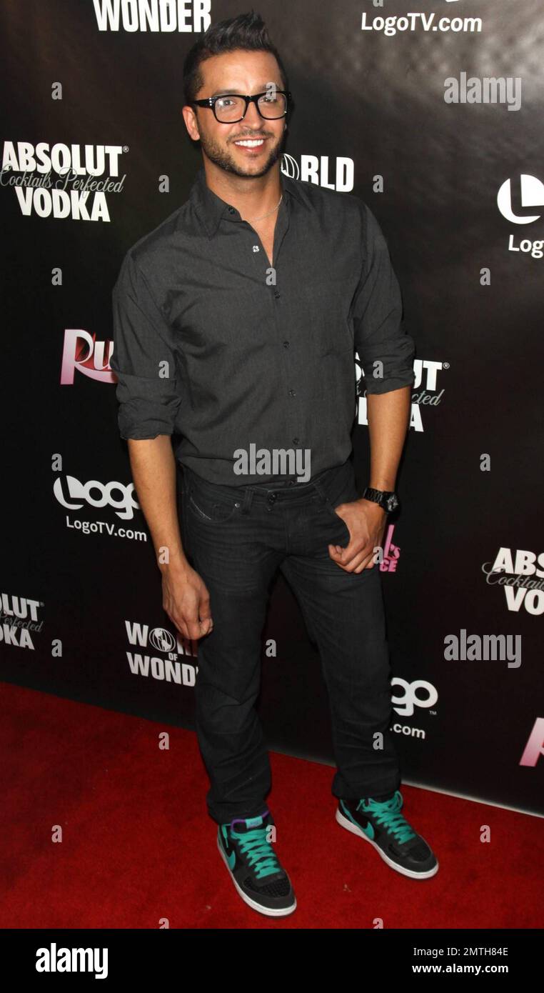 TV personality Jai Rodriguez poses for photographers on the red carpet ...
