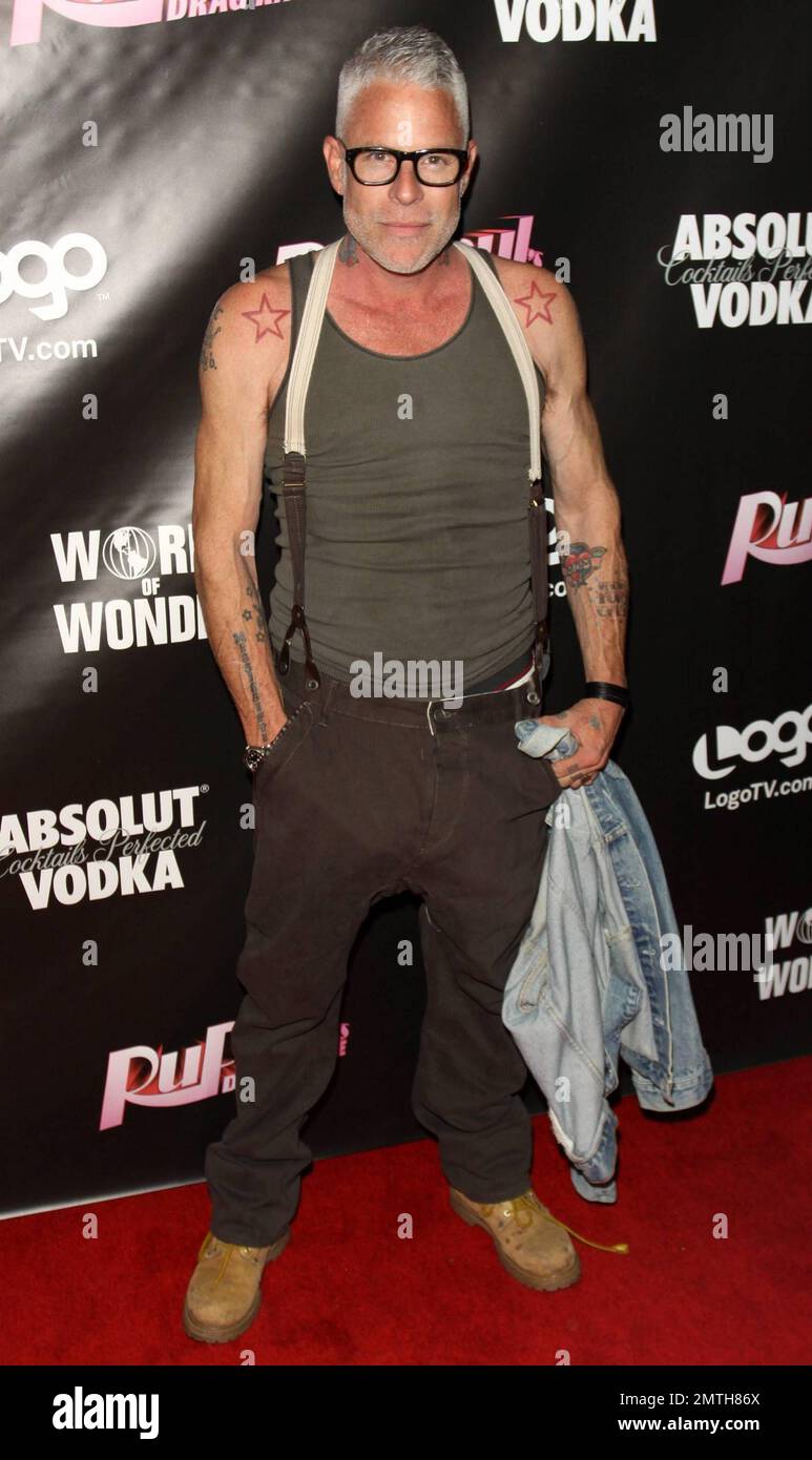 Makeup artist Billy B poses for photographers on the red carpet at Rage ...