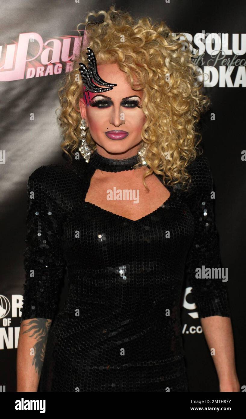 Phoenix poses for photographers on the red carpet at Rage Nightclub ...