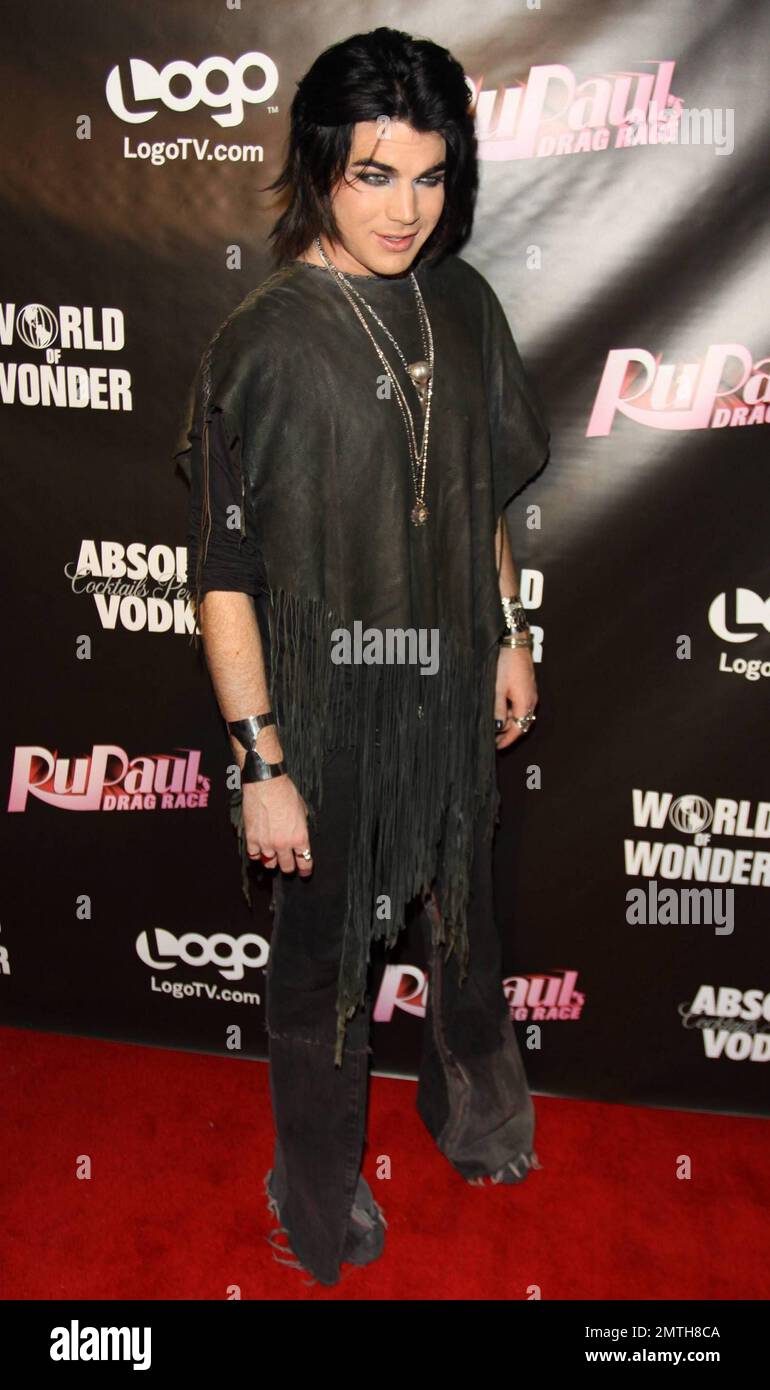 In a leather fringe poncho, leather bellbottoms and blue eye makeup ...