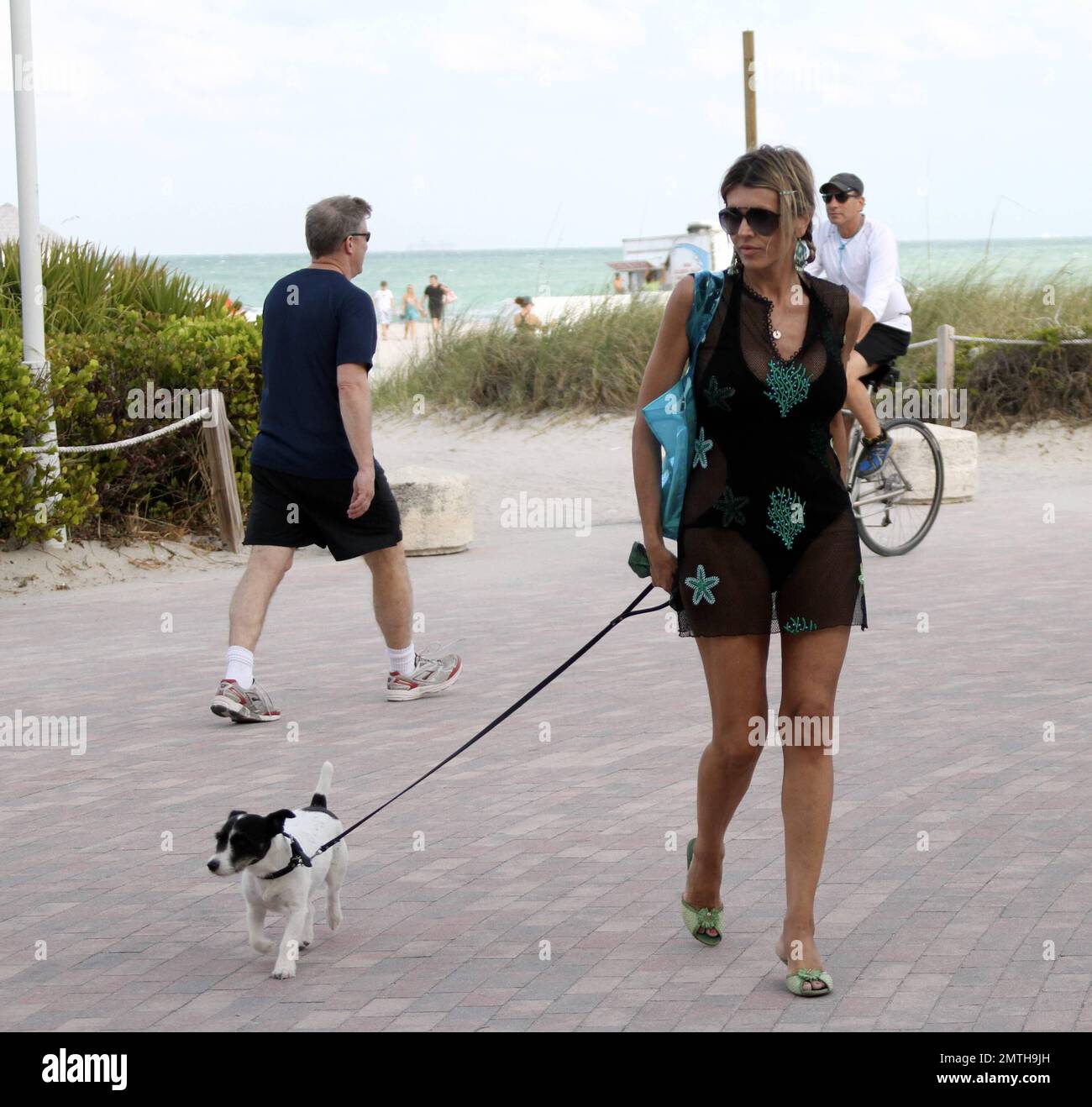 Rita Rusic, 51, shows off her stunning figure in a black one-piece. The ...