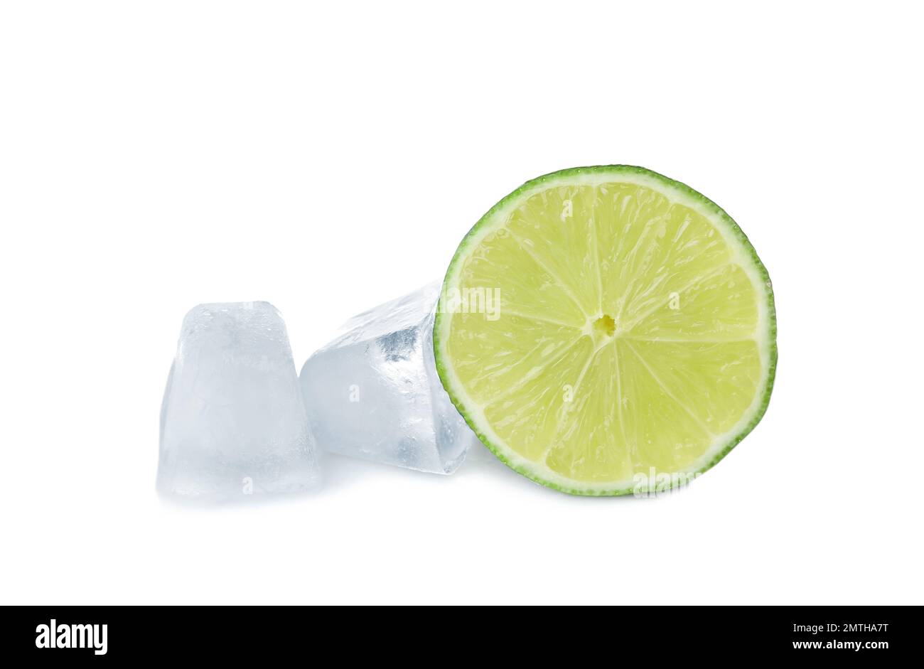 Ice cubes and lime on white background Stock Photo - Alamy