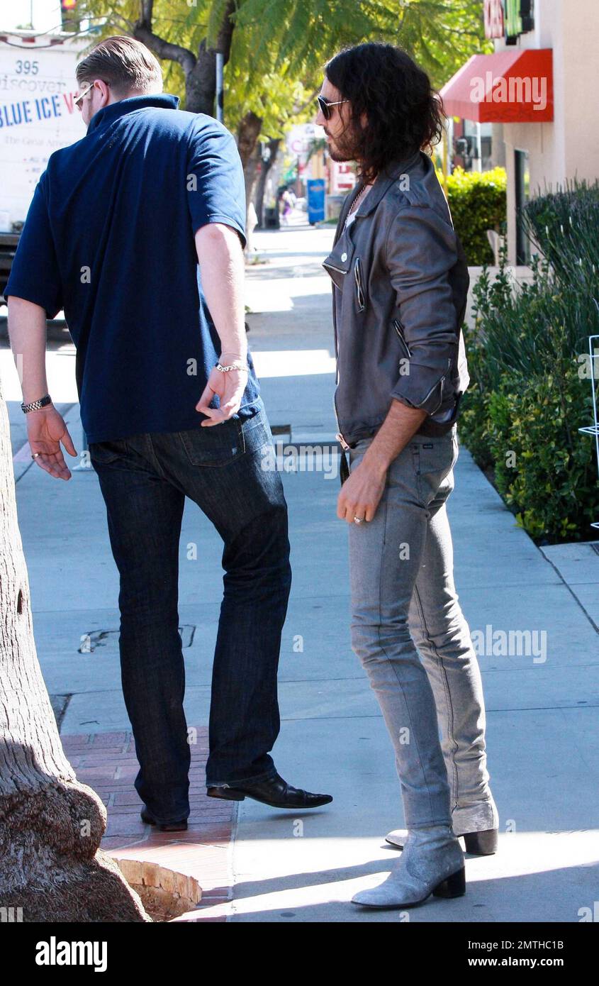 EXCLUSIVE!! British comedian Russell Brand poses with fans and gives a ...