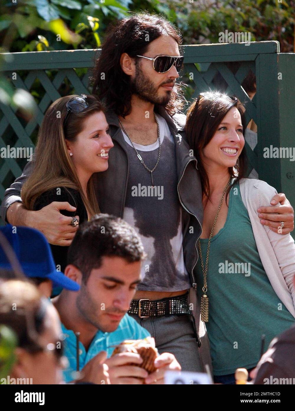EXCLUSIVE!! British comedian Russell Brand poses with fans and gives a ...
