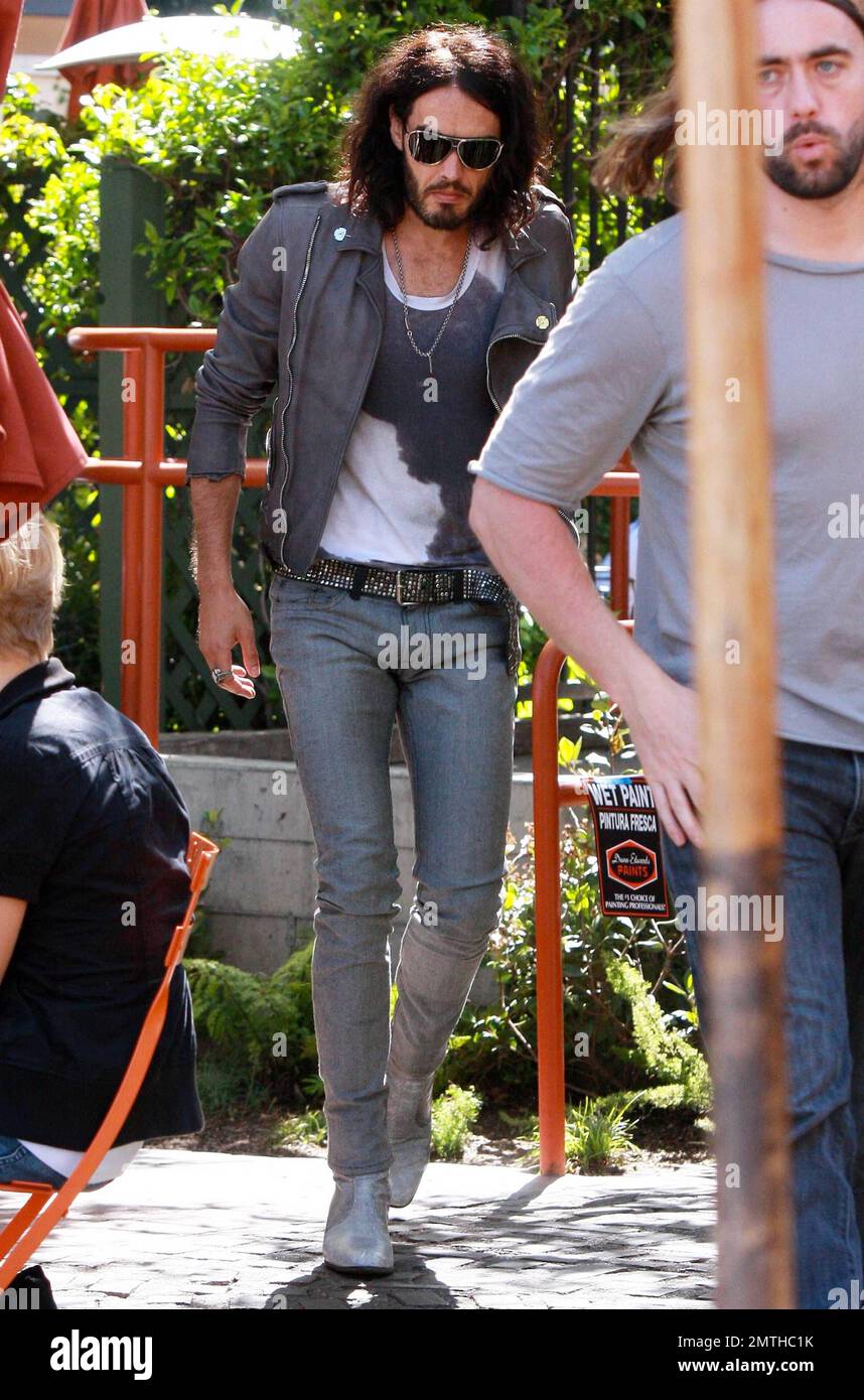 EXCLUSIVE!! British comedian Russell Brand poses with fans and gives a ...