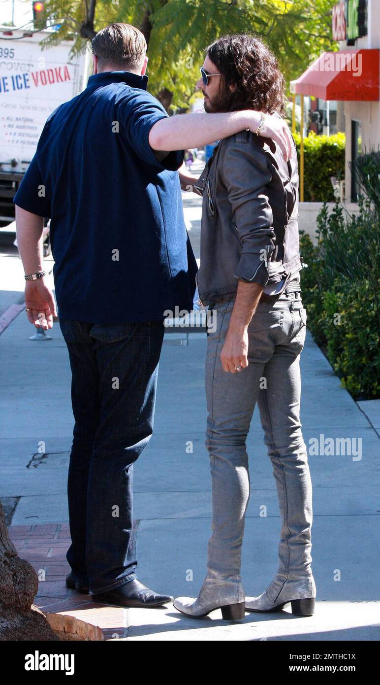 EXCLUSIVE!! British comedian Russell Brand poses with fans and gives a ...