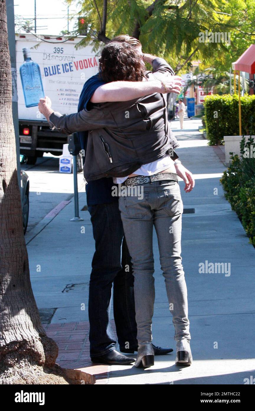 EXCLUSIVE!! British comedian Russell Brand poses with fans and gives a ...