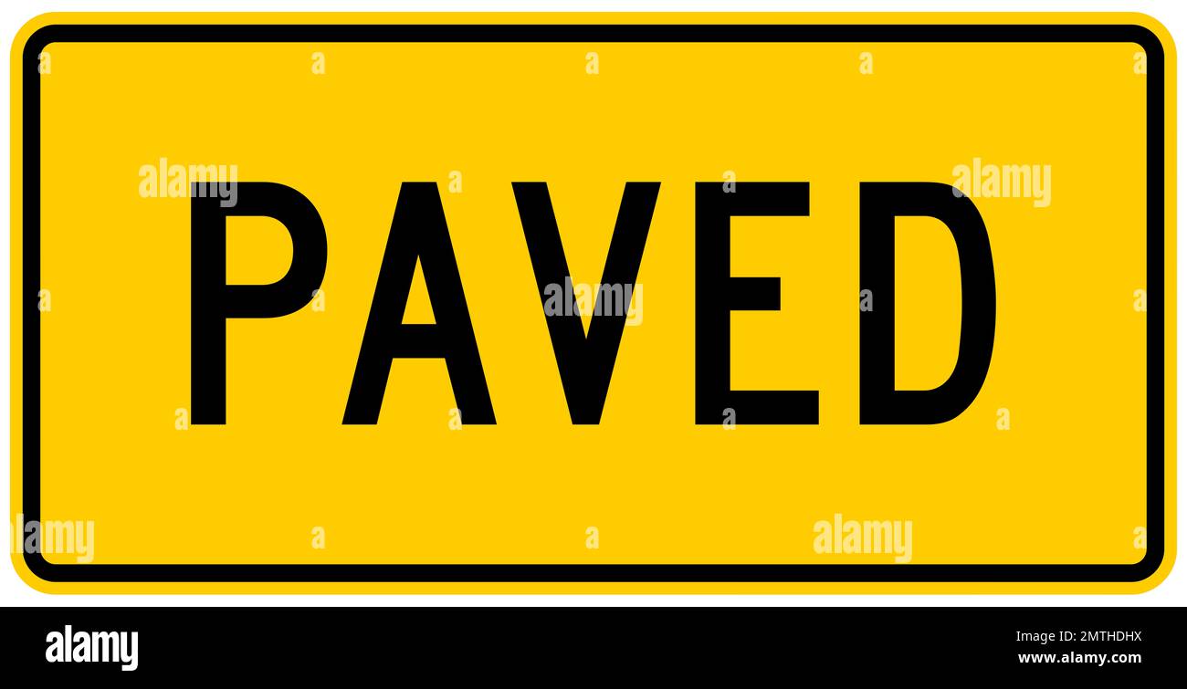 Paved road warning sign Stock Photo - Alamy