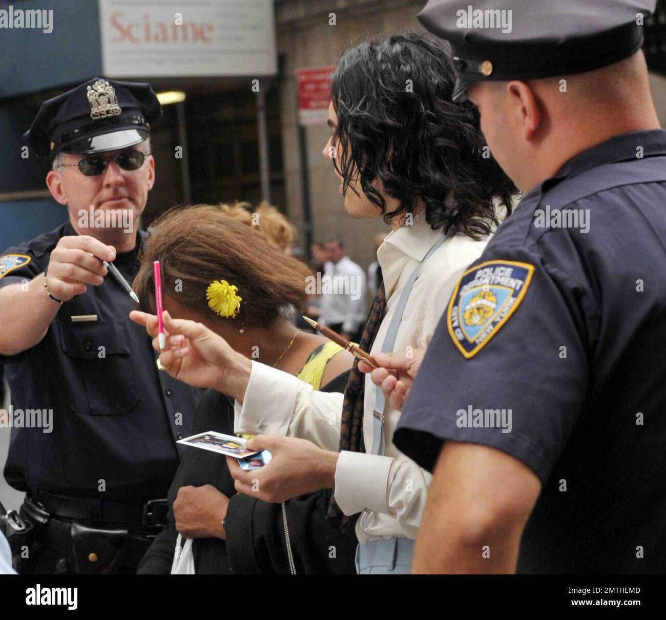 Costumed actor and comedian Russell Brand pretends to be drunk and ...