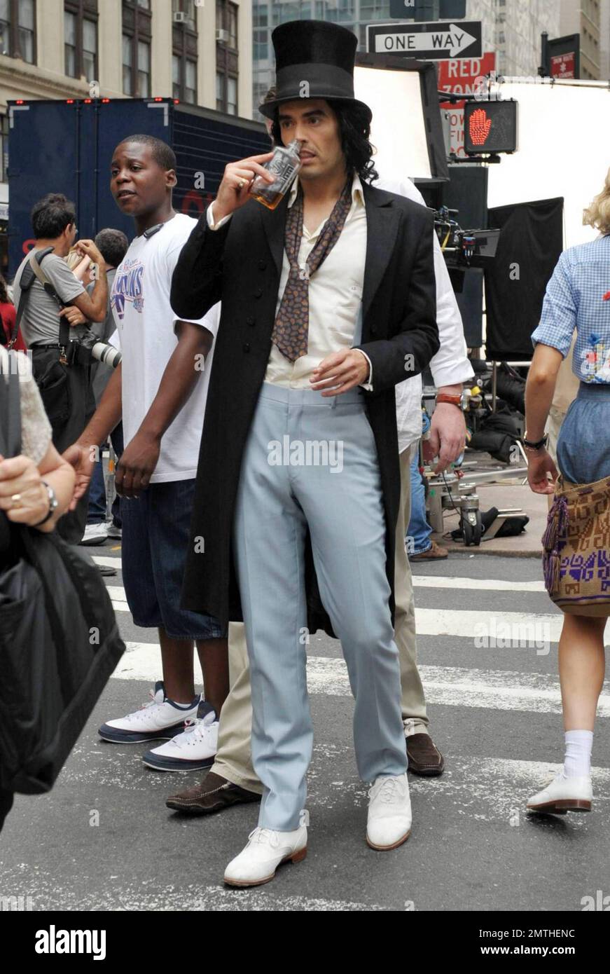 Costumed actor and comedian Russell Brand pretends to be drunk and ...