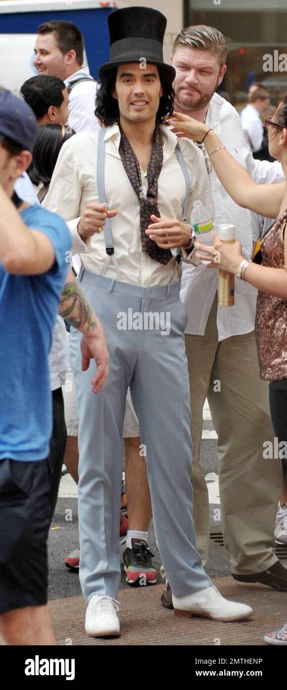 Costumed actor and comedian Russell Brand pretends to be drunk and ...