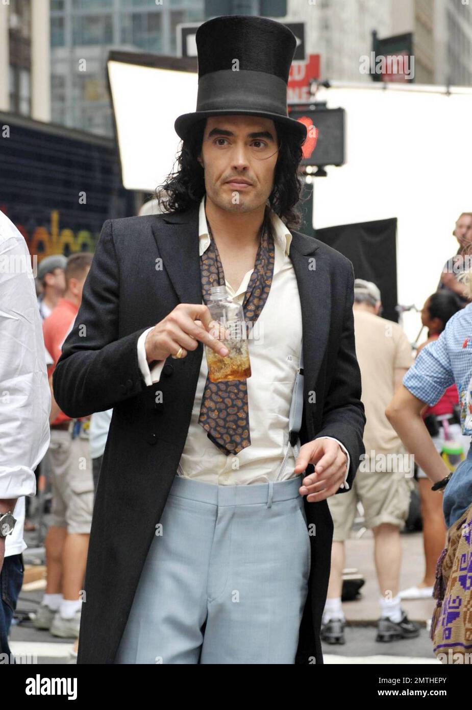 Costumed actor and comedian Russell Brand pretends to be drunk and ...