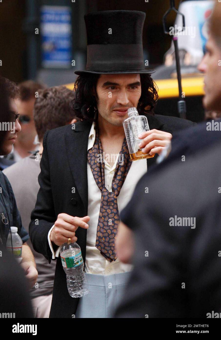 Costumed actor and comedian Russell Brand pretends to be drunk and ...