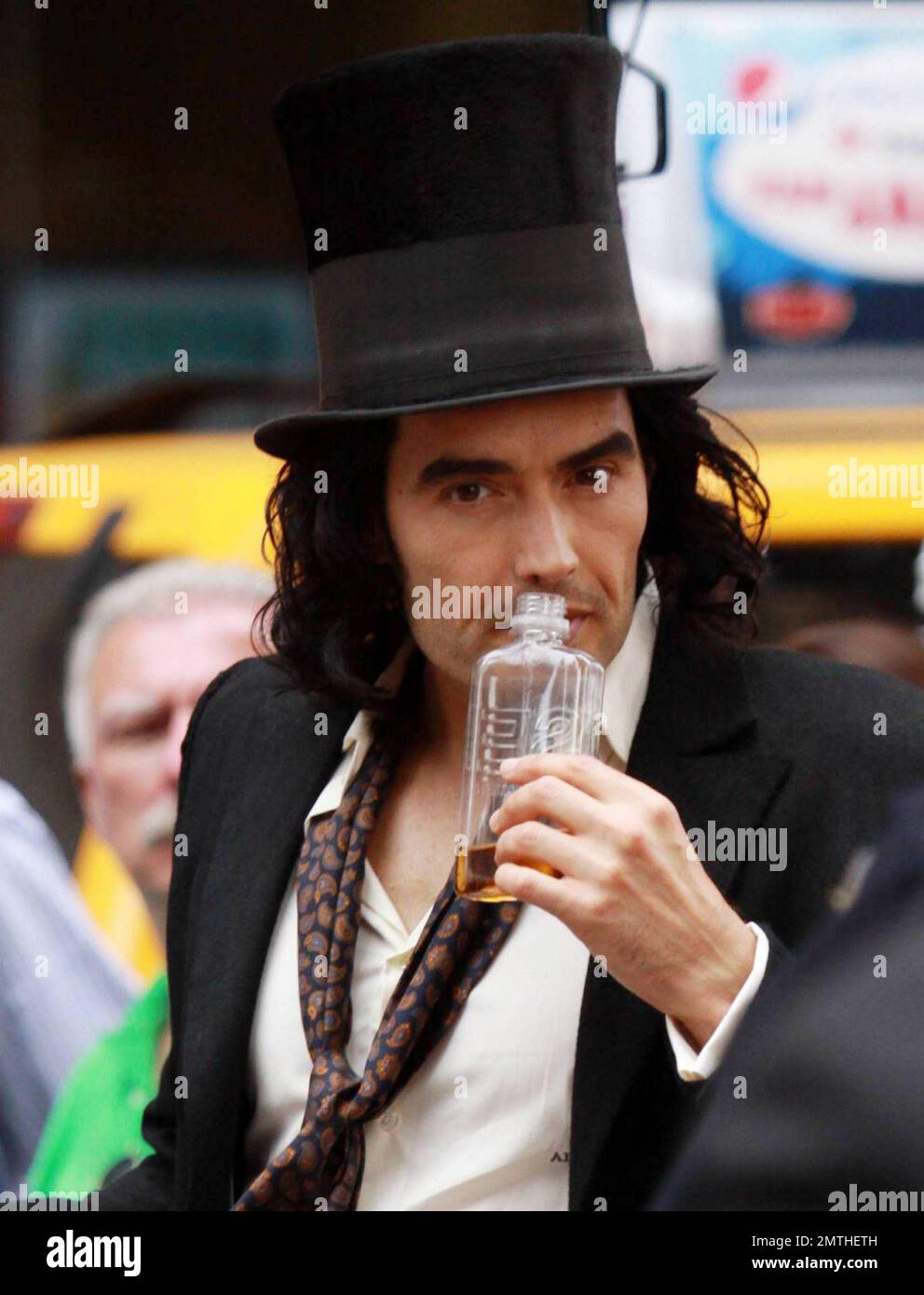 Costumed actor and comedian Russell Brand pretends to be drunk and ...