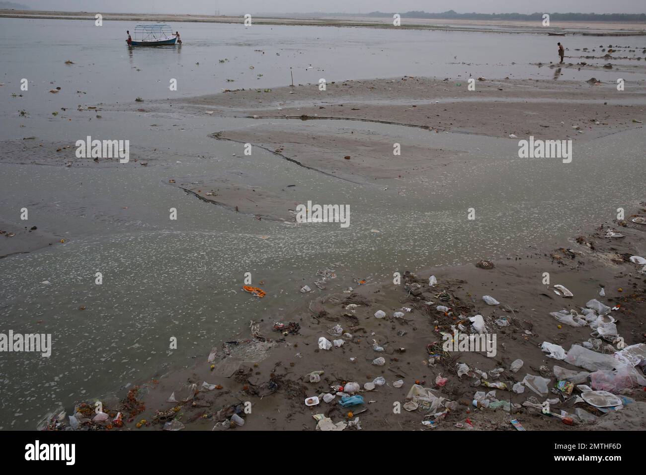 Plastic bags and garbage is littered on the banks of River Ganges on ...
