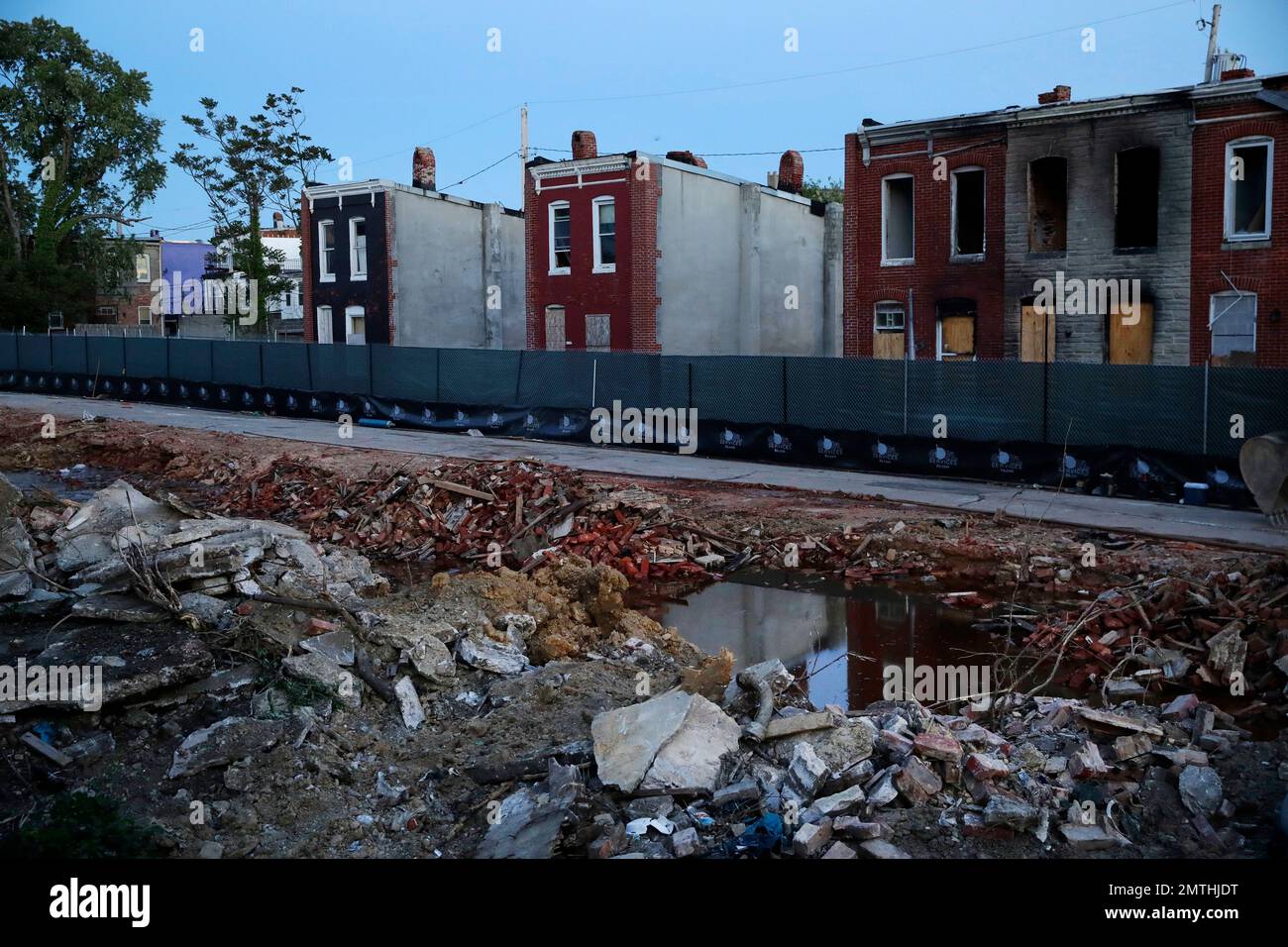 In this May 3, 2017 photo, debris sits where a block of abandoned row ...
