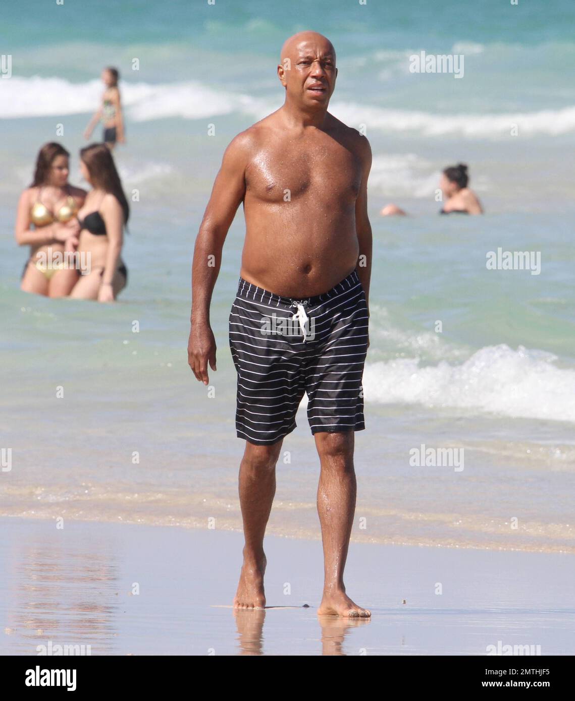 Hip hop mogul Russell Simmons spends a day at the beach with daughters ...