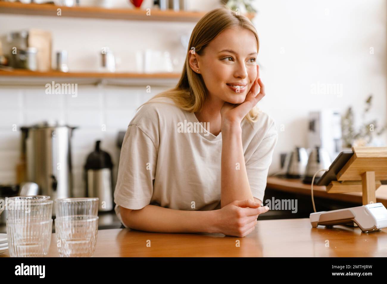 Lady Leaning On Counetr