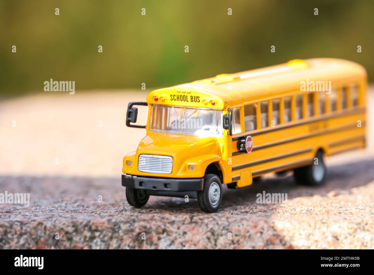 Toy yellow schoolbus hi-res stock photography and images - Alamy